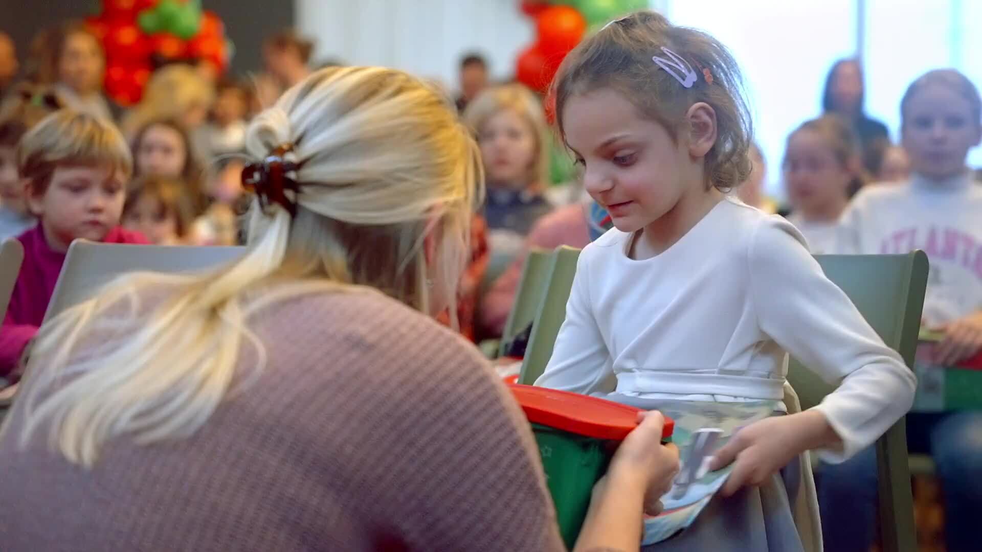 Elizabeth Groff Hands Out 200 Millionth Shoebox to Ukrainian Girl